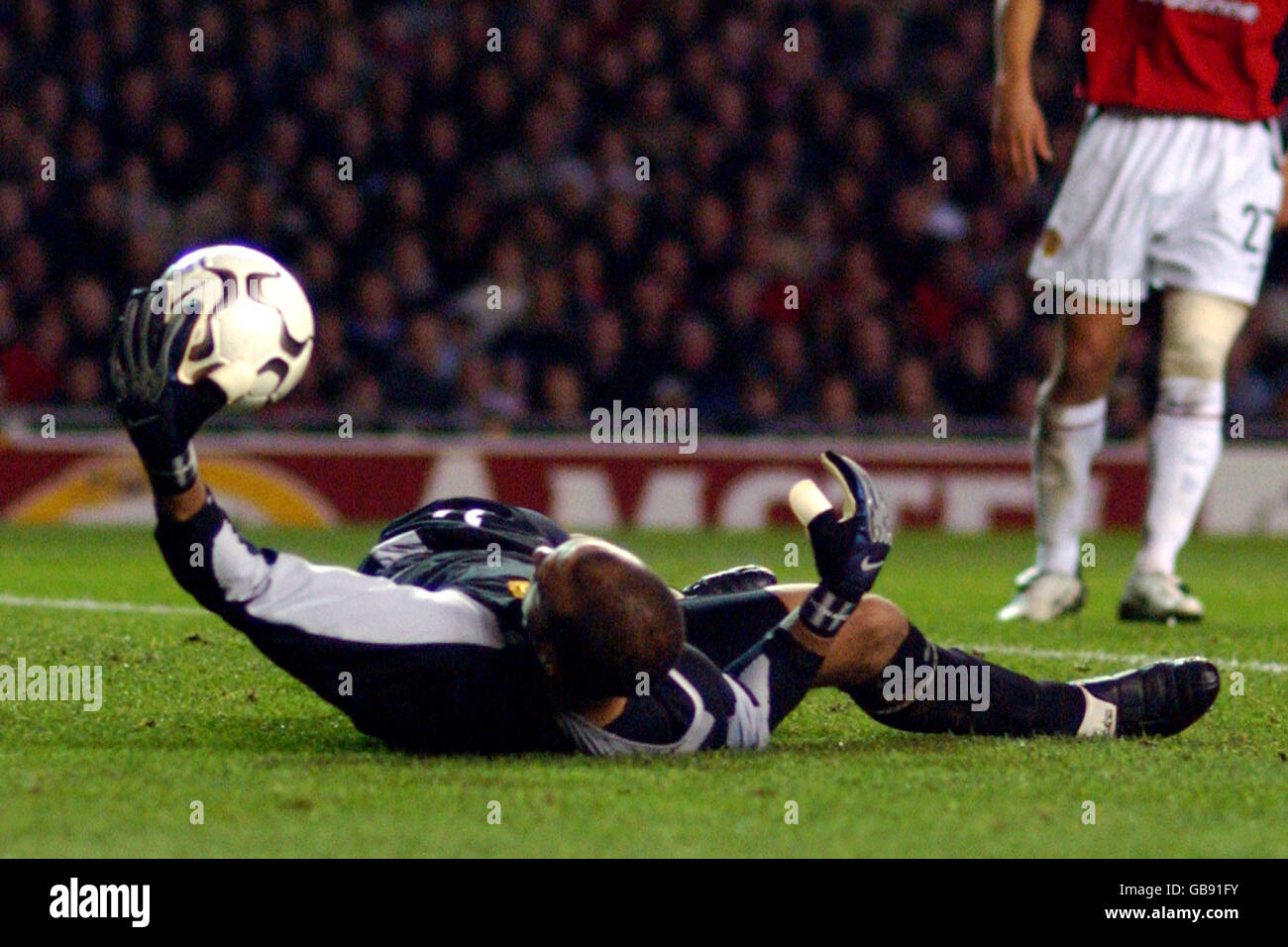 Manchester united goalkeeper tim howard stretches to make a save hi-res ...