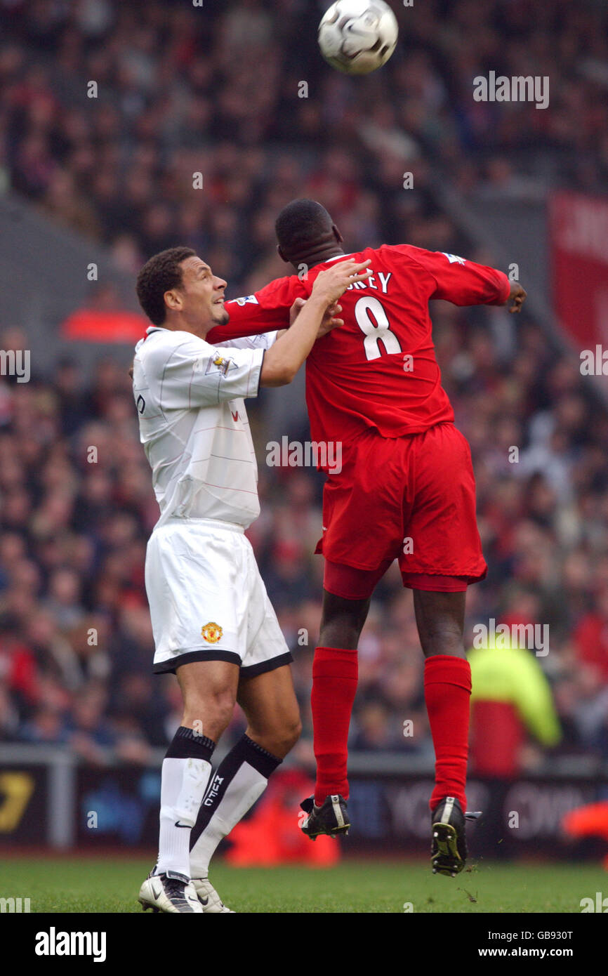 (L-R) Liverpool's Emile Heskey wins the heaader above Manchester United ...