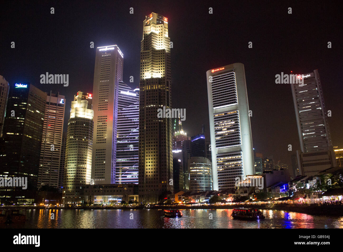 Walk around the Merlion promenade in Singapore in the night with the ...
