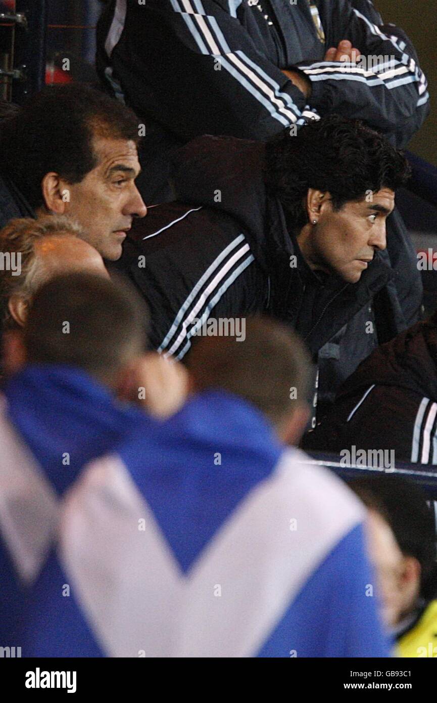Argentina manager Diego Maradona (above right) in the stands during the ...