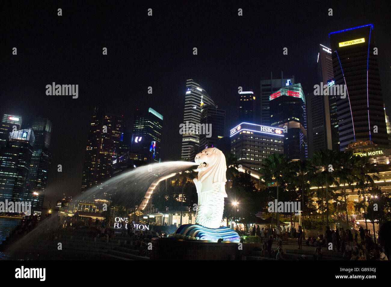 Walk around the Merlion promenade in Singapore in the night with the ...