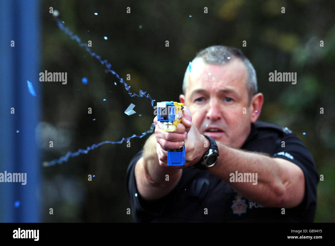 Taser stun gun demonstration Stock Photo - Alamy