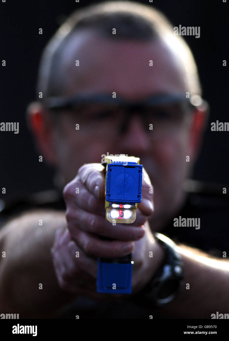 Taser stun gun demonstration Stock Photo - Alamy