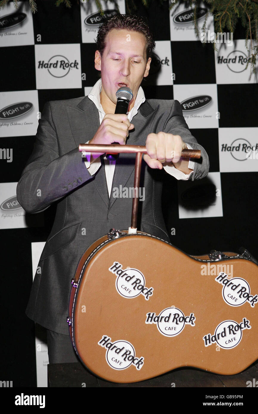 Brendan Cole Turns on the Hard Rock Cafe's Christmas Tree Lights ...