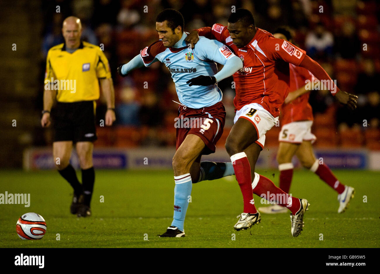 Barnsleys kayode odejayi and burnleys clarke carlisle hi-res stock ...