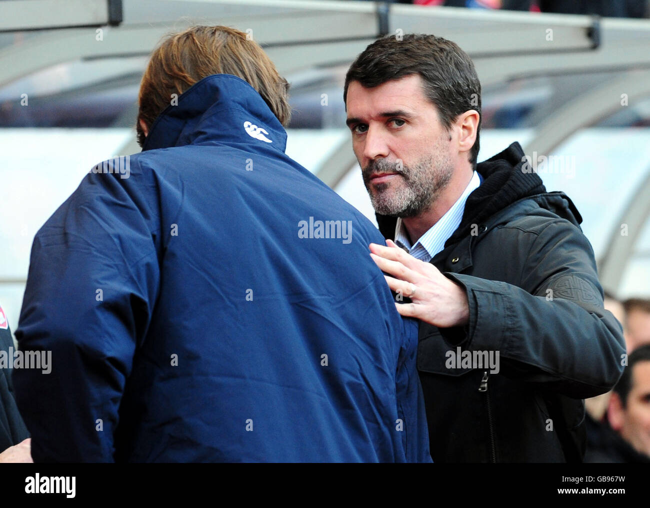 Portsmouth manager Tony Adams (left) and Sunderland manager Roy Keane ...