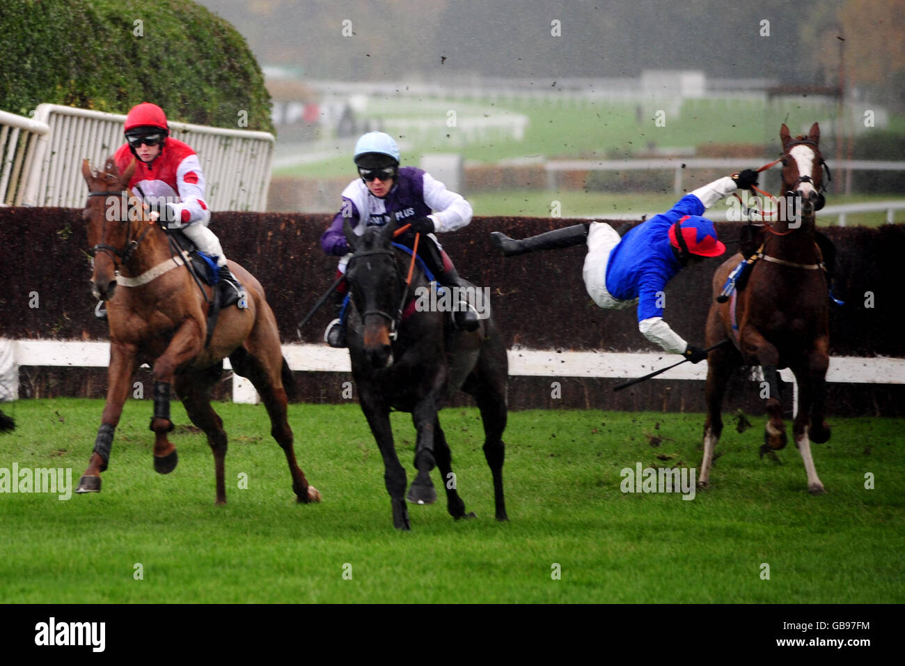 Jockey Darren O'Dwyer (r) is unseated by Kervriou during the Bulmers ...
