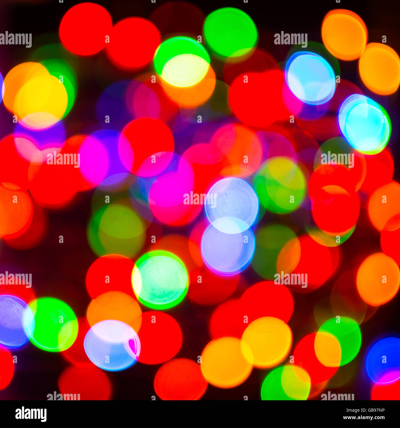 Multicolor lightbulb background, square. Bokeh background Stock Photo ...
