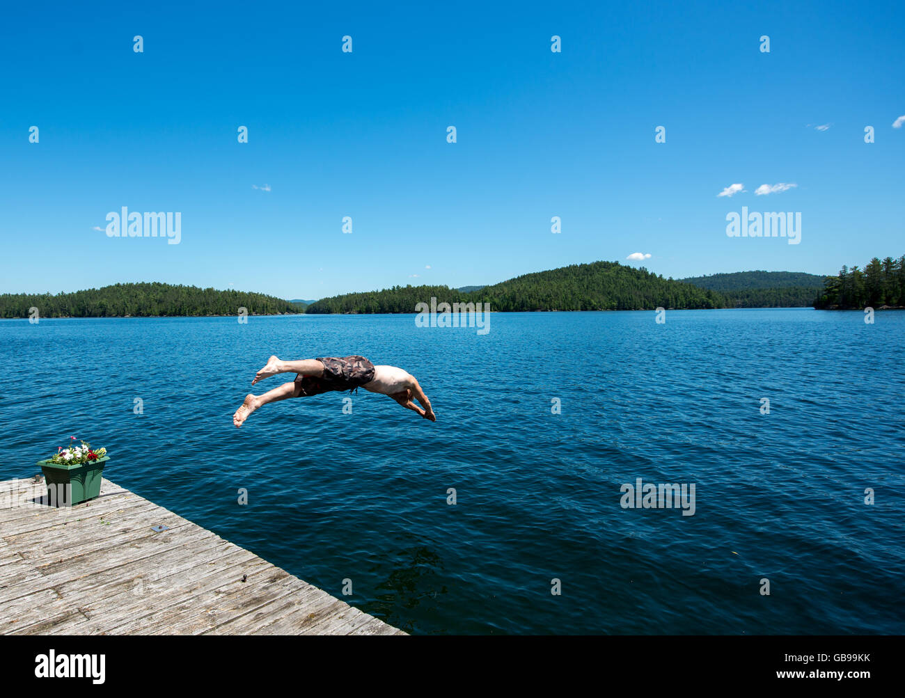 Man diving into water hi-res stock photography and images - Alamy