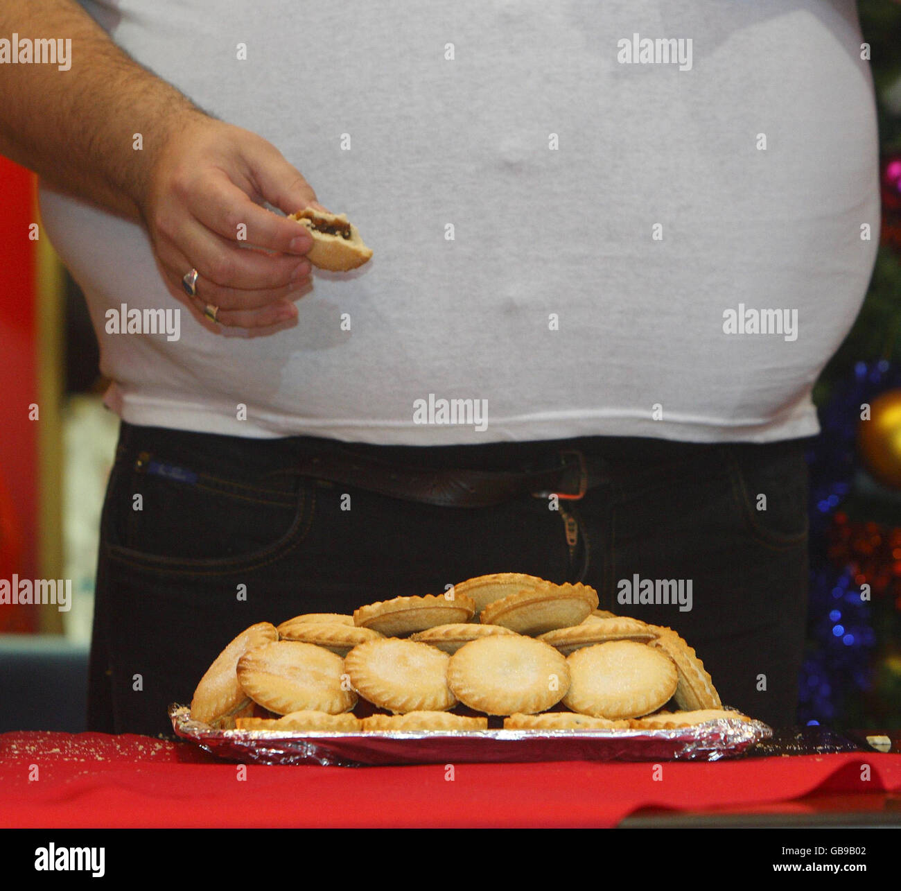 An entrant in the Big Eat Mince Pie Eating Contest at Wookey Holes in ...