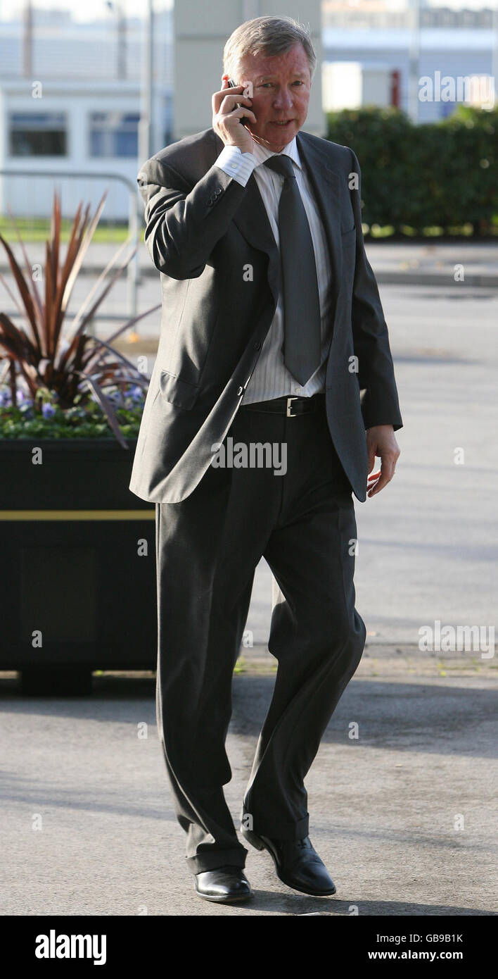 Manchester United manager Sir Alex Ferguson arrives for his ...