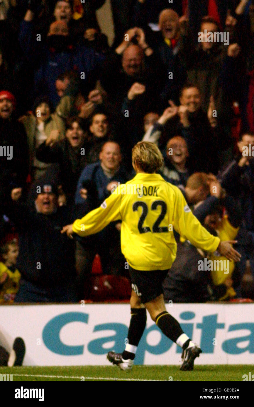 Watford's Lee Cook celebrates his equalising goal infront of the ...