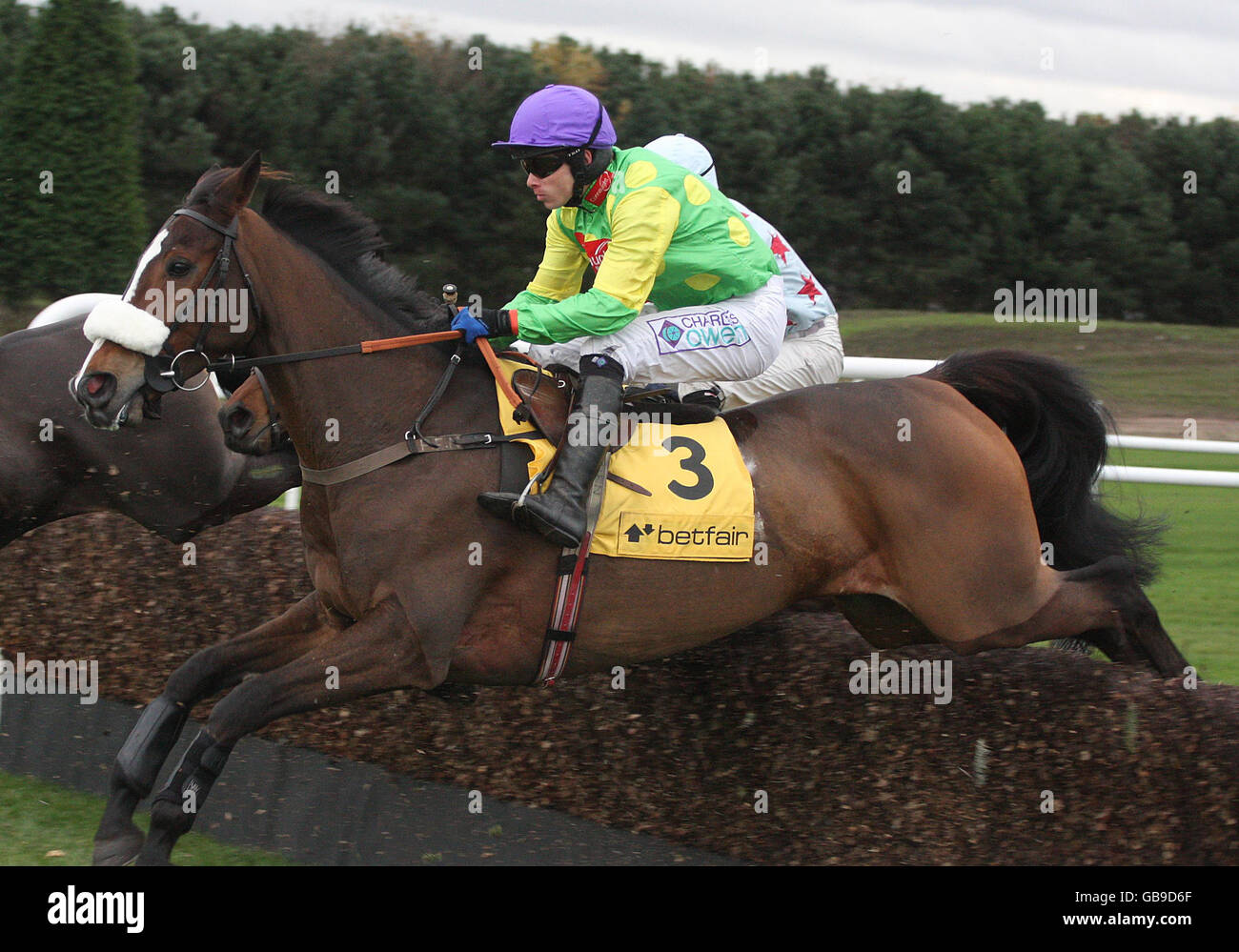 Kauto Star and jockey Sam Thomas jumping in fine style in early stages ...