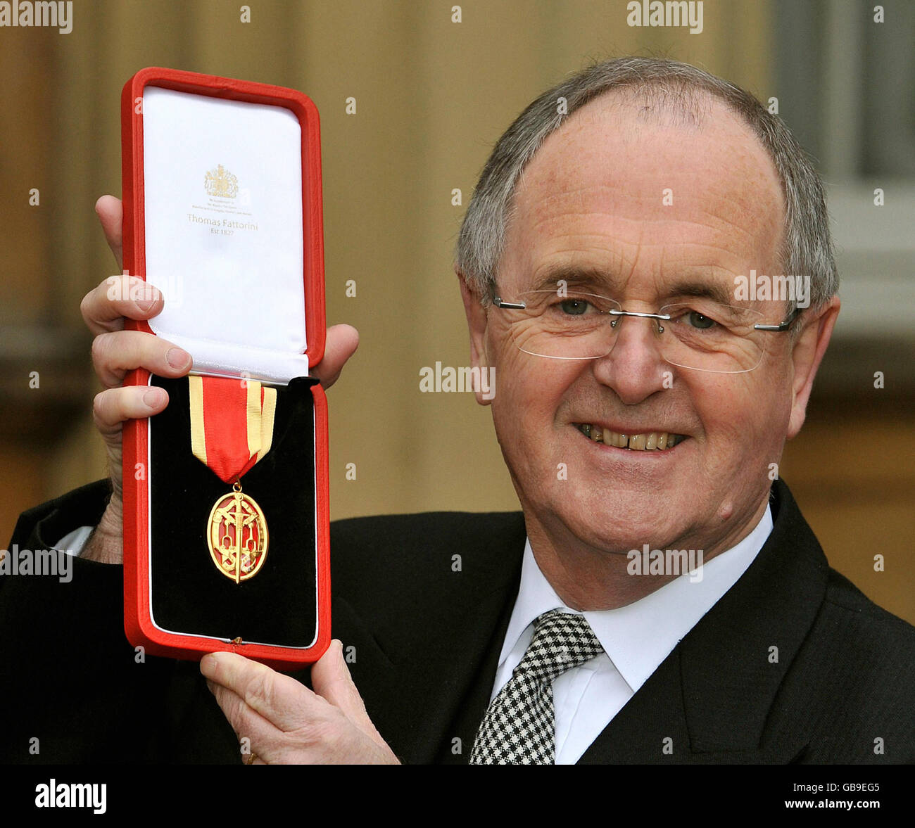 Sir Alan Beith holds his Honour of Knighthood award after it was ...