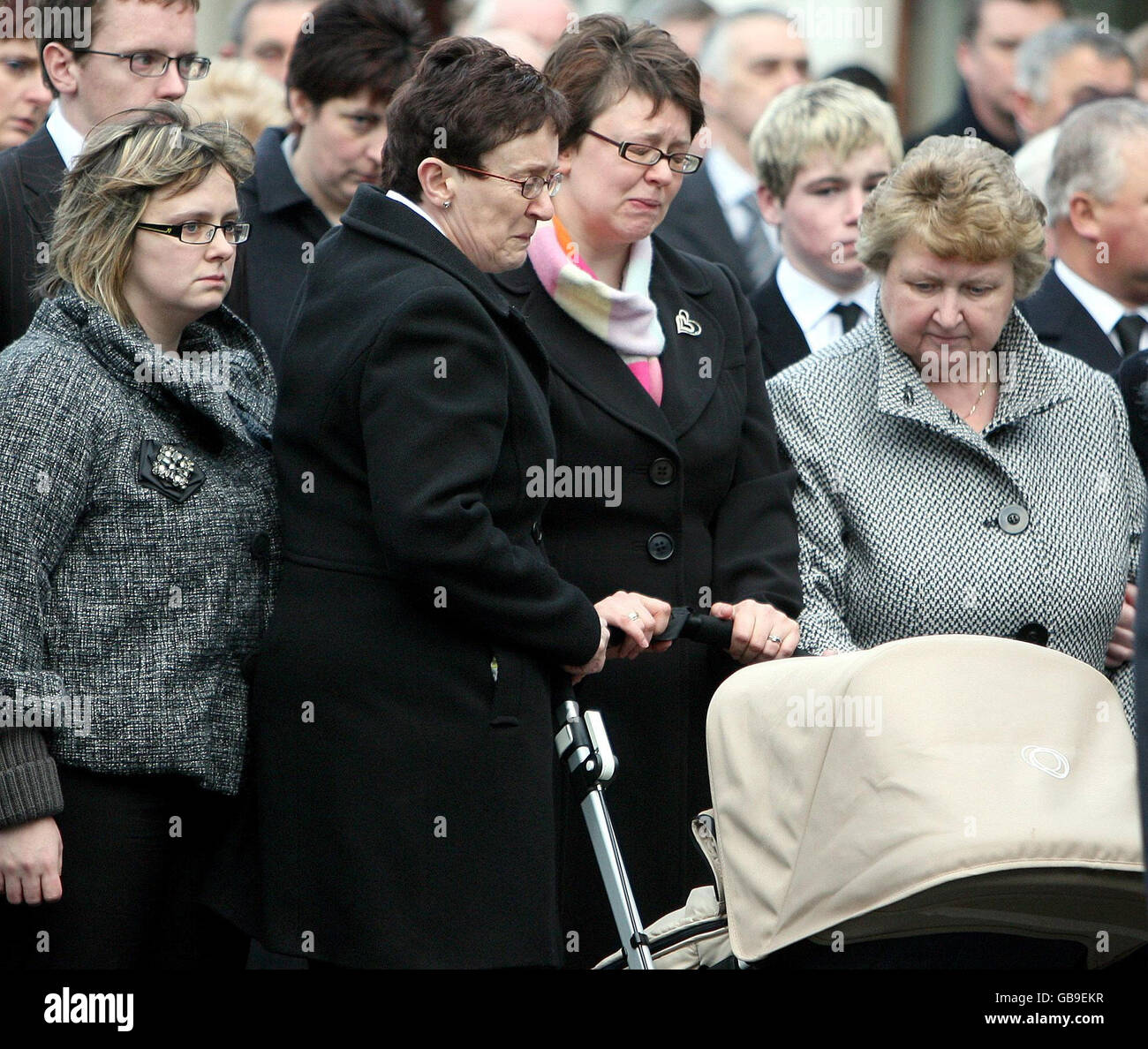 Andrea Irvine (2nd right),widow of Constable Kenneth Irvine,with their ...