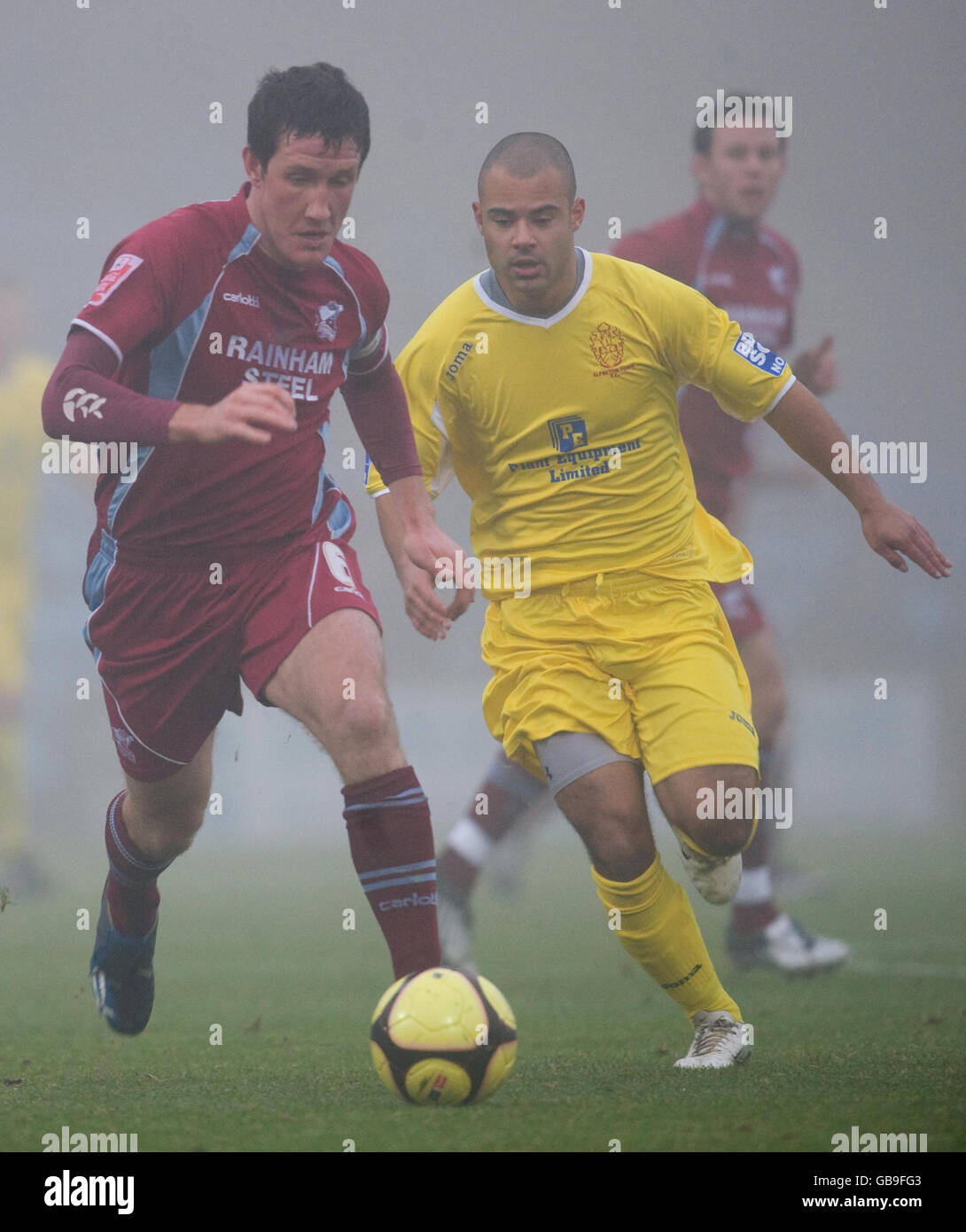 Alfreton Town's Ben Muirhead tackles Scunthorpe United's Cliff Byrne ...