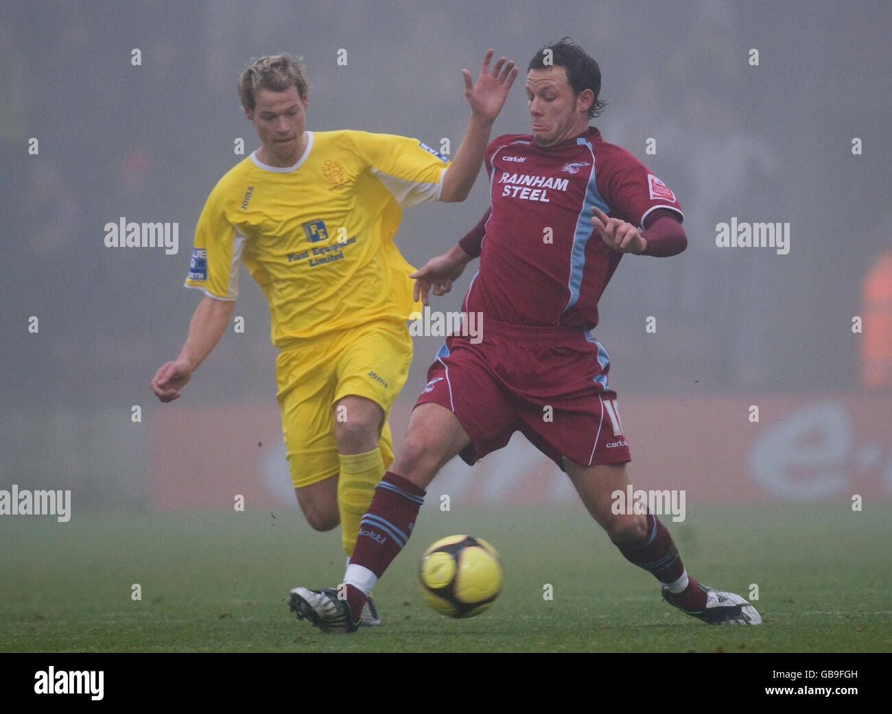 Alfreton Town's Kris Bowler tackles Scunthorpe United's Sam Togwell ...
