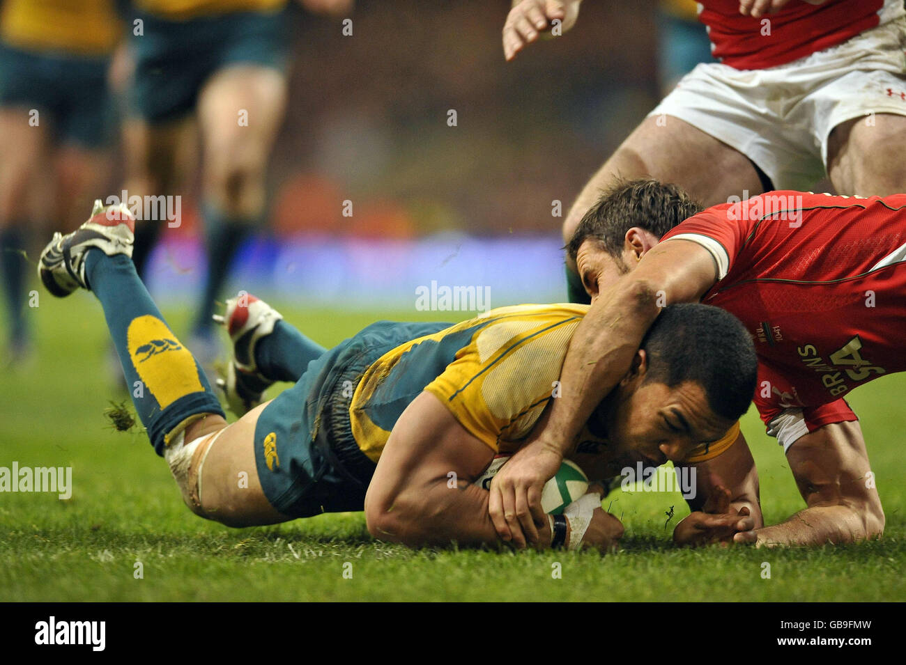 Australia's Digby Ioane scores a try during the Invesco Perpetual ...