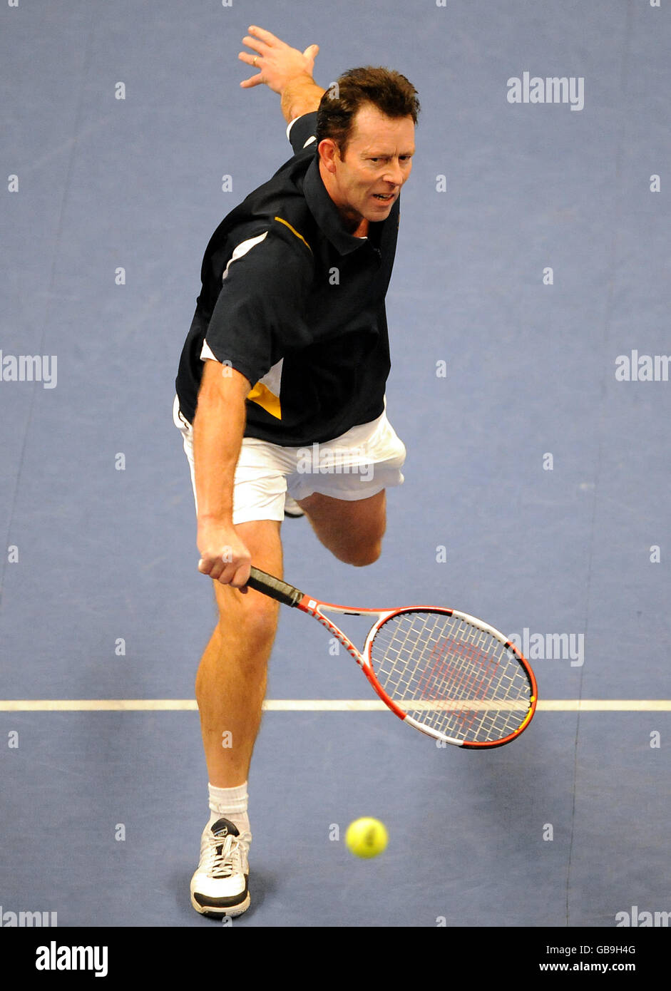 Jeremy Bates in action during his match with Cedric Pioline Stock Photo ...