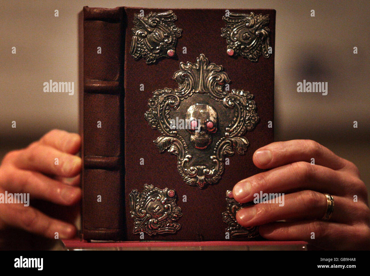 JK Rowling's first editor Barry Cunningham holds his copy of 'Tales of ...