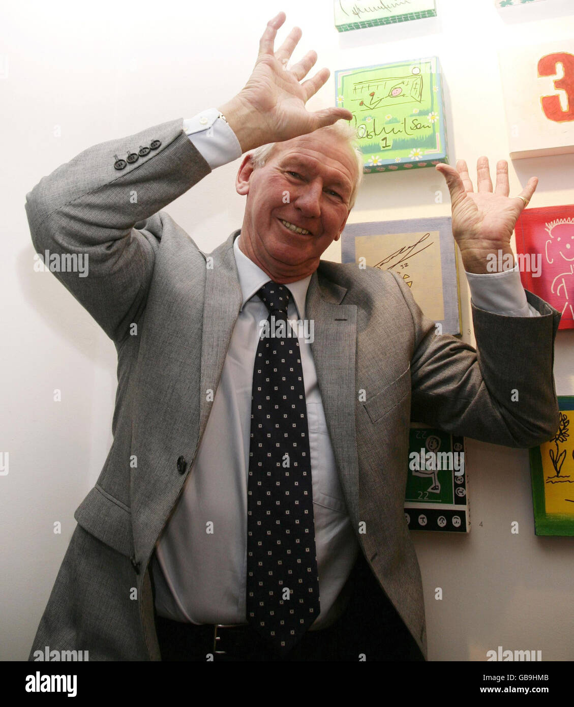 Former goalkeeper Bob Wilson posing next to his artwork during the ...