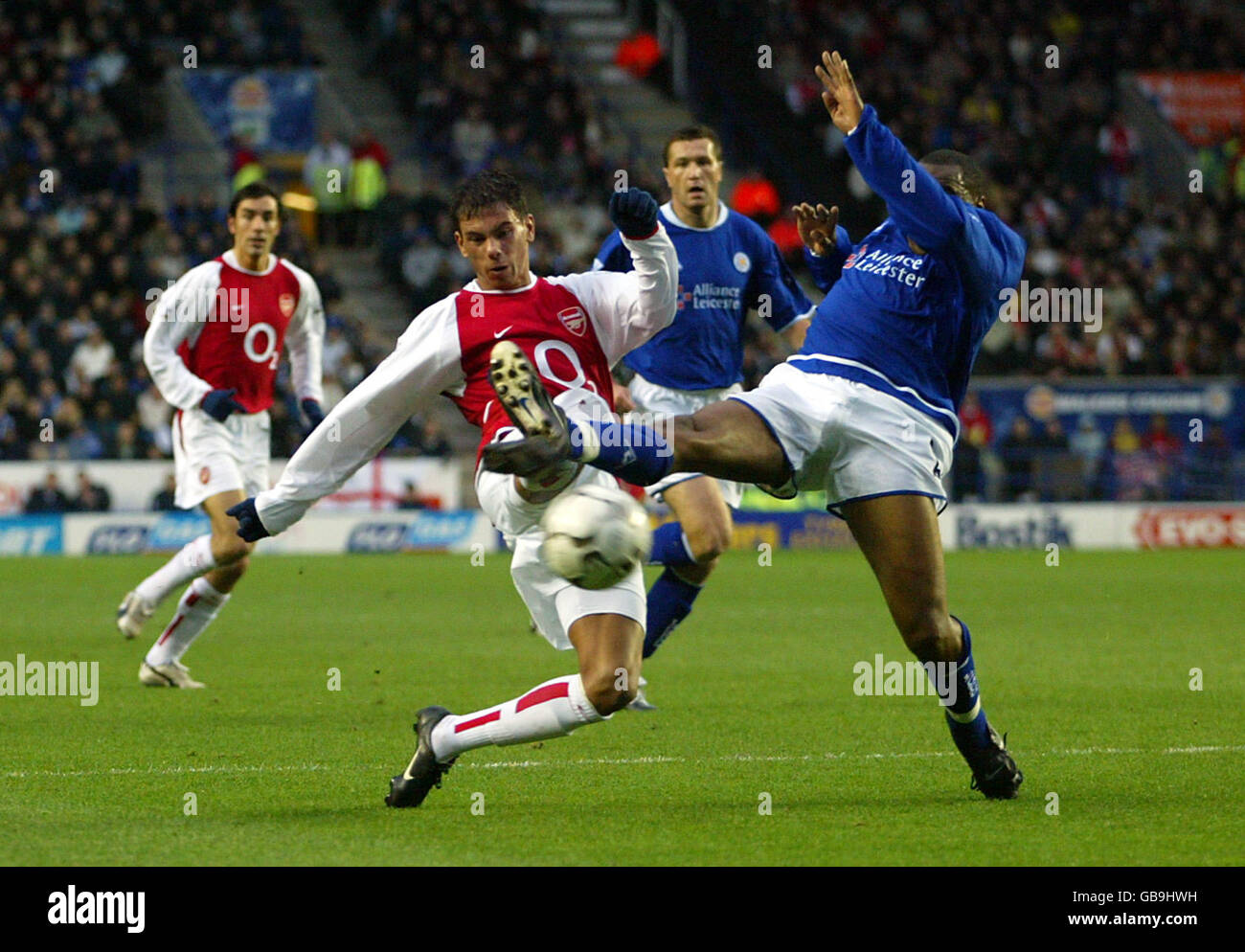 Leicester citys andy impey and arsenals jeremie aliadiere hi-res stock ...