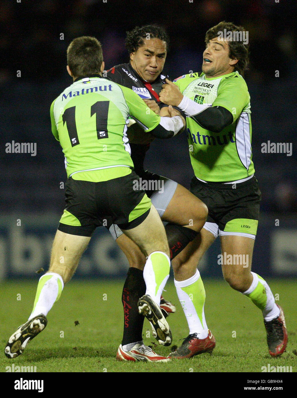 Sale's Andy Tuilagi is tackled by Montauban's Miguel Avramovic and Jean ...