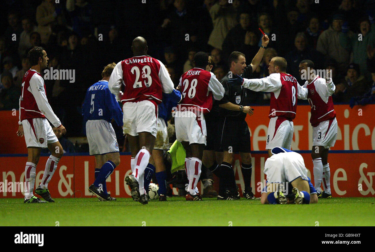 Arsenal's Ashley Cole is shown the red card by referee Rob Styles after ...