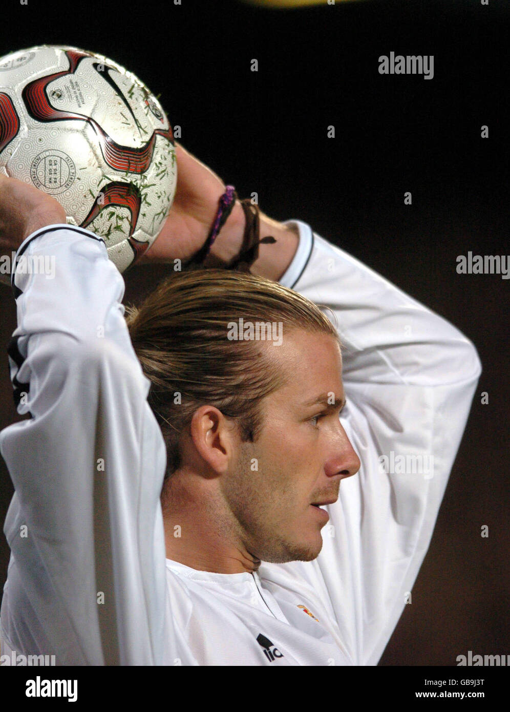 Real madrids david beckham take a throw hi-res stock photography and ...