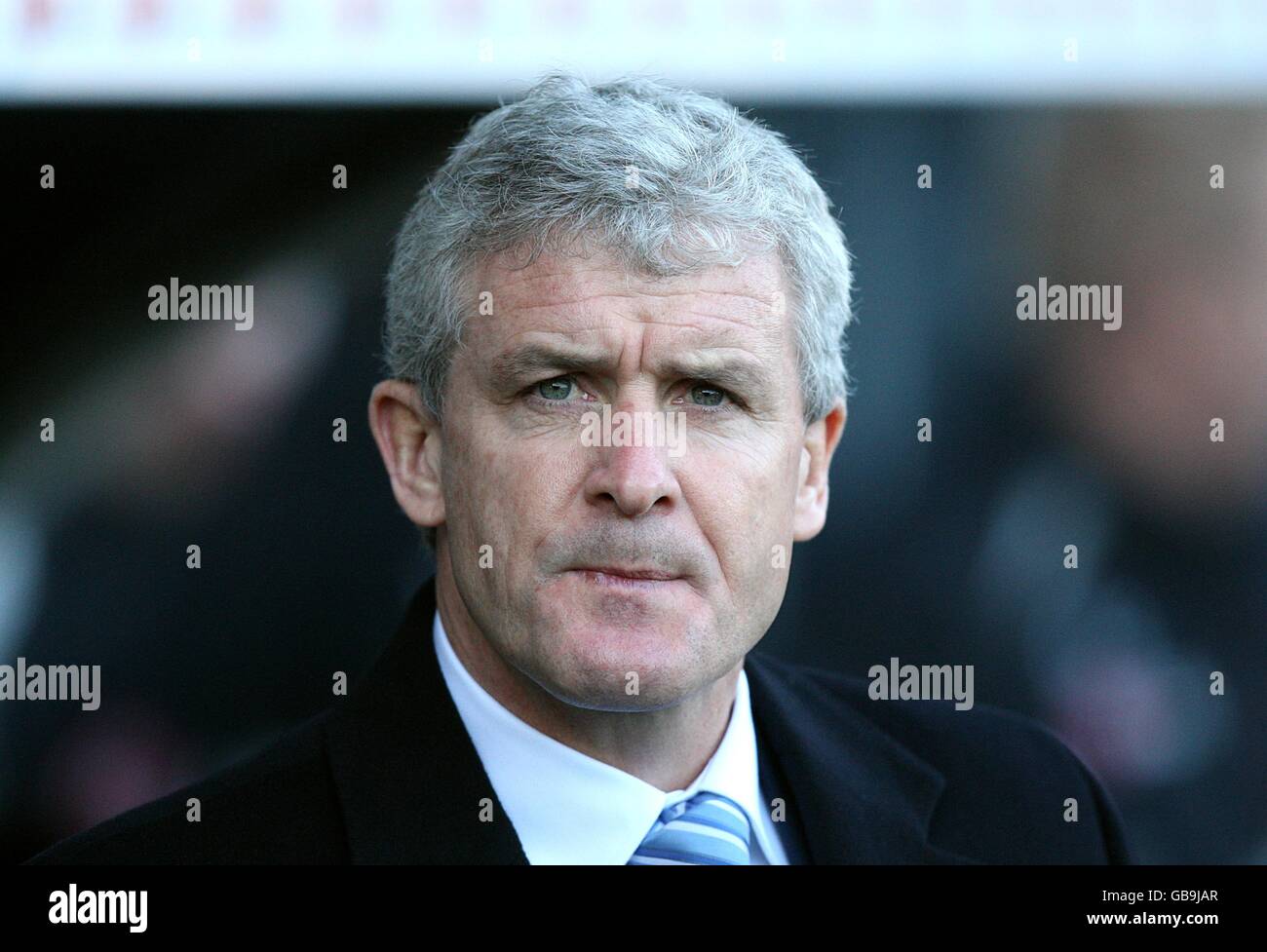 Manchester city manager mark hughes prior to kick off hi-res stock ...