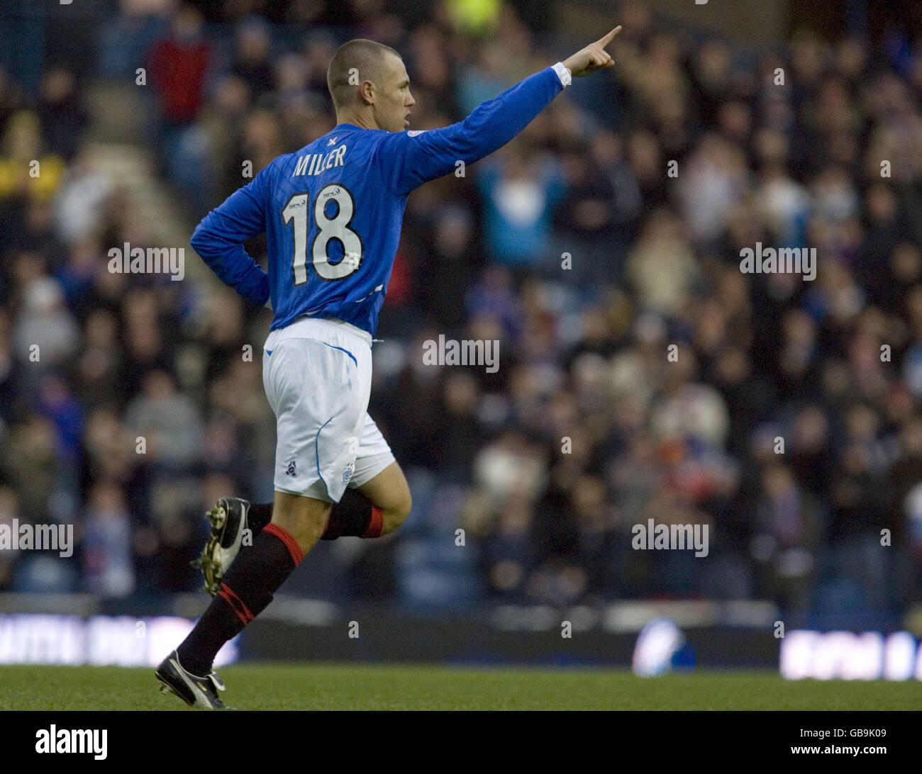 Rangers' Kenny Miller celebrates scoring his sides first goal during ...