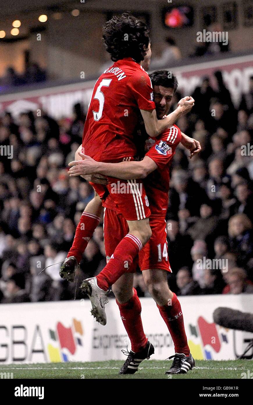 Liverpool's Xabi Alonso celebrates after scoring the first goal with ...