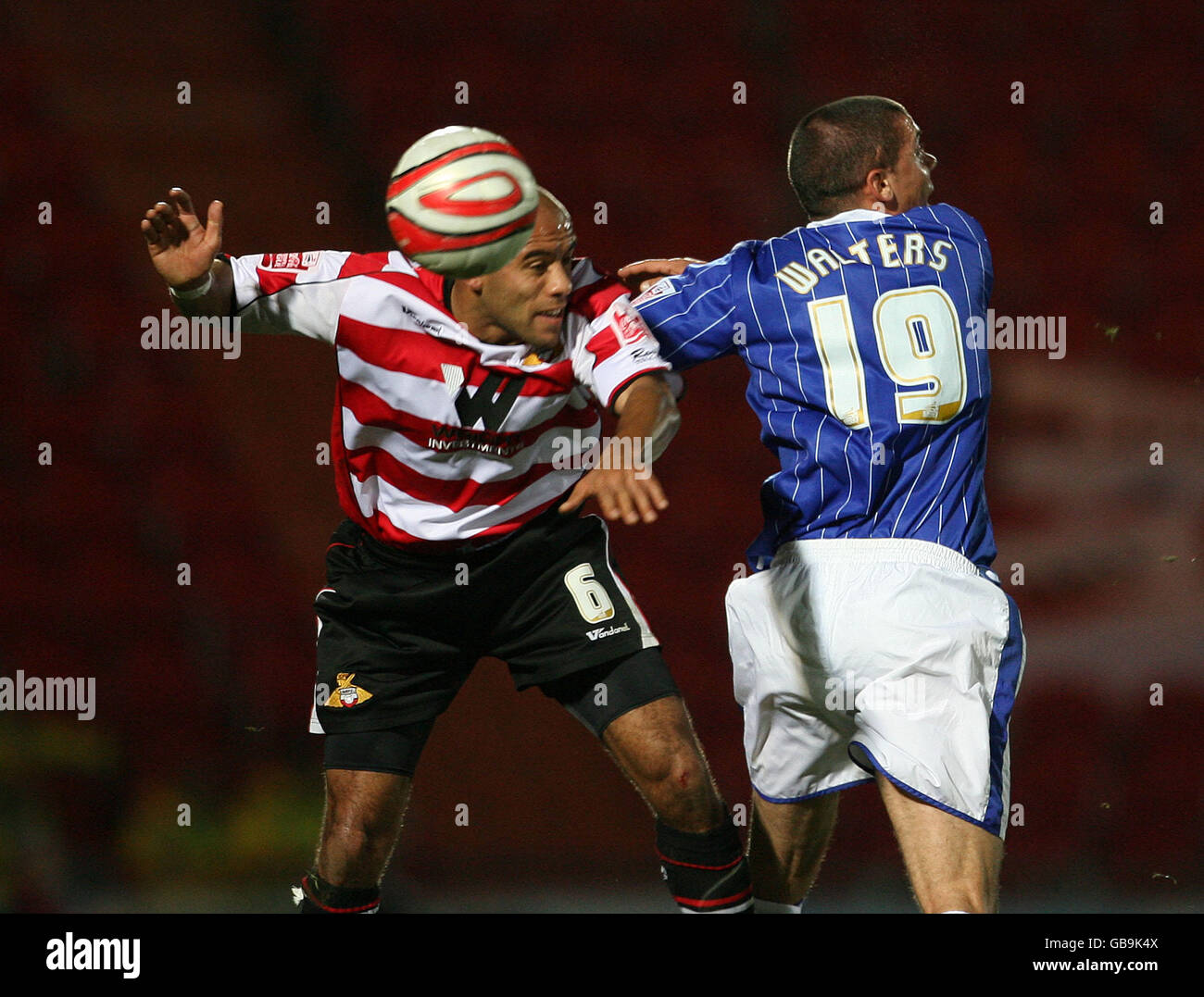 Doncaster Rovers James Chambers (left) and Ipswich Town's Jonathan ...