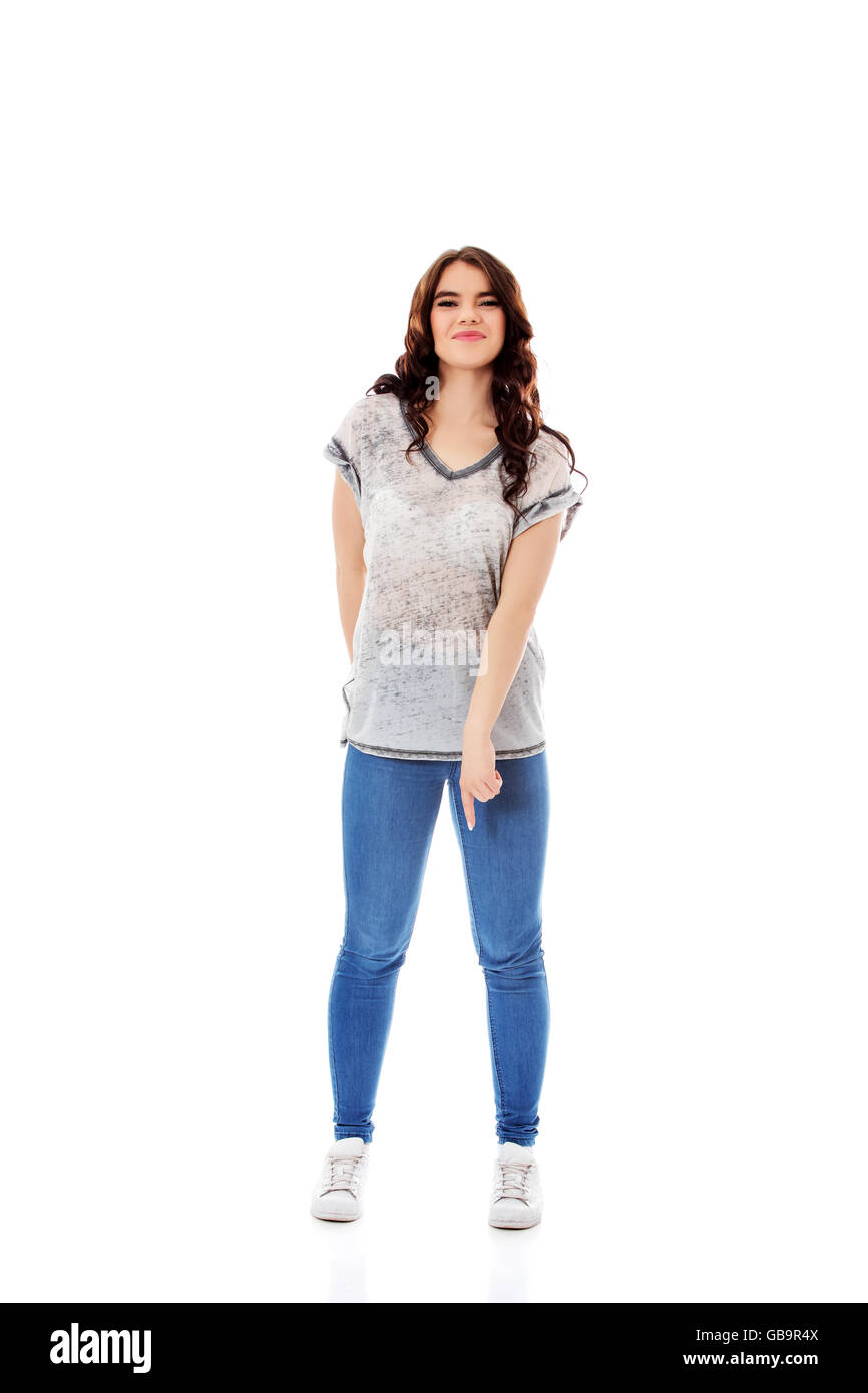 Young student woman pointing down Stock Photo - Alamy