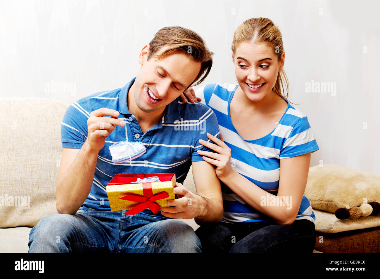 Woman hugging red box hi-res stock photography and images - Alamy