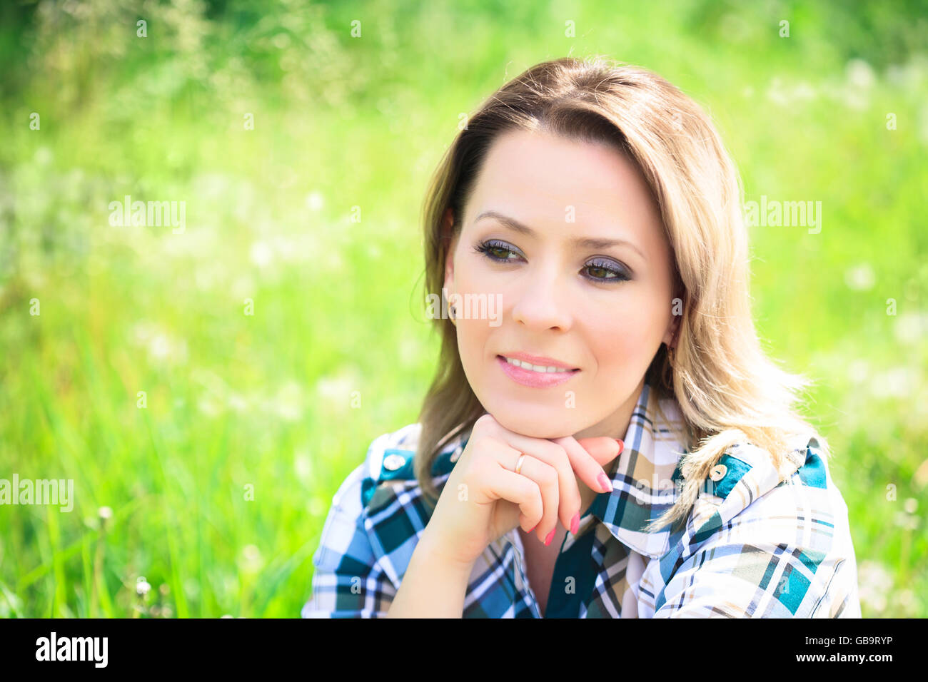 Portrait of a beautiful young attractive woman outdoors in the summer Stock Photo - Alamy