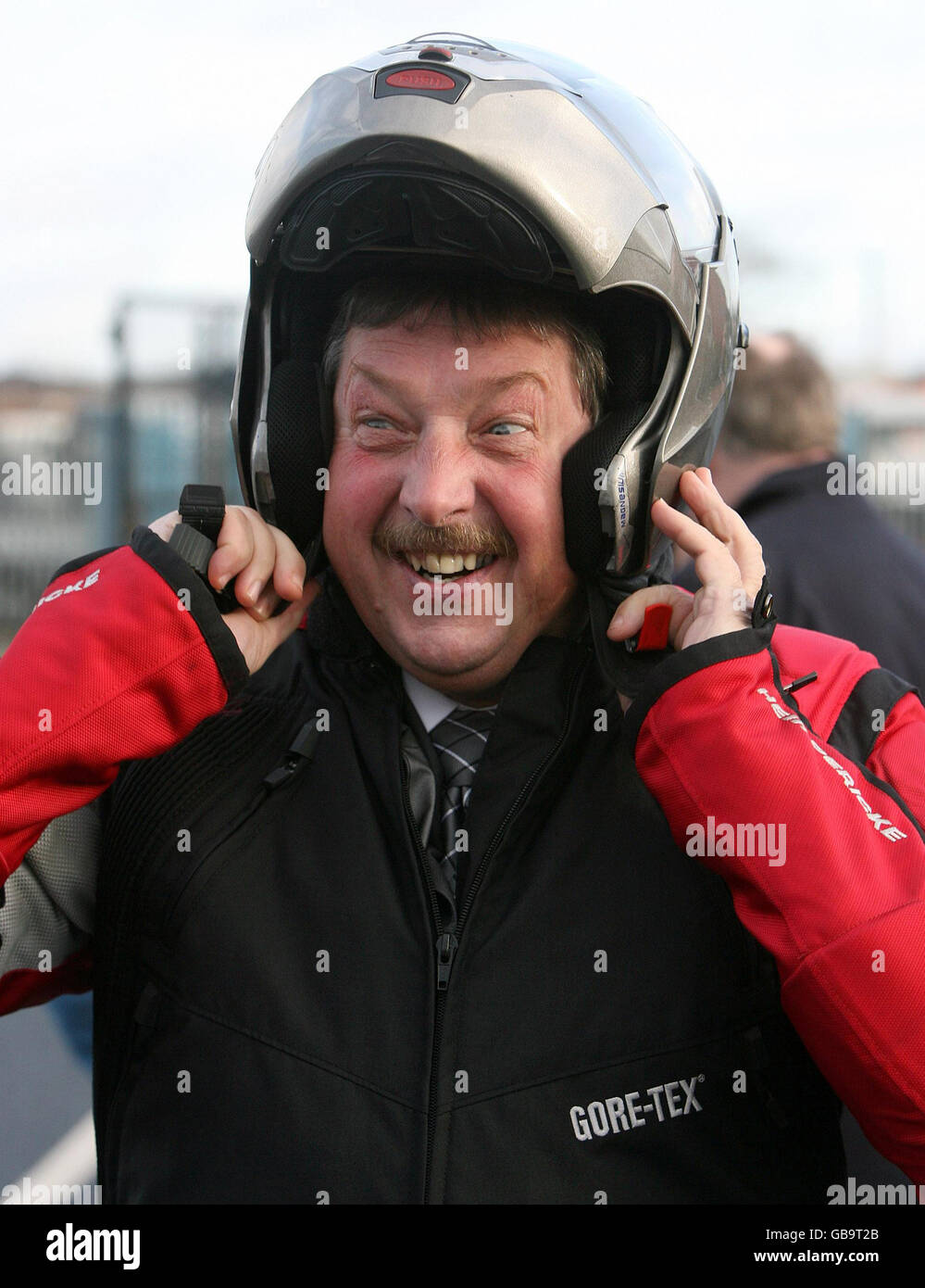 Northern Ireland Environment Minister Sammy Wilson whilst trying the ...