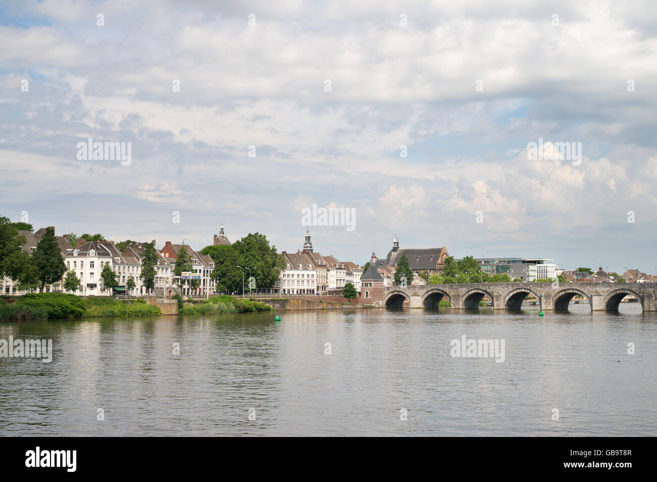 Maastricht seen across the river Meuse with St. Servatius Bridge bridge ...