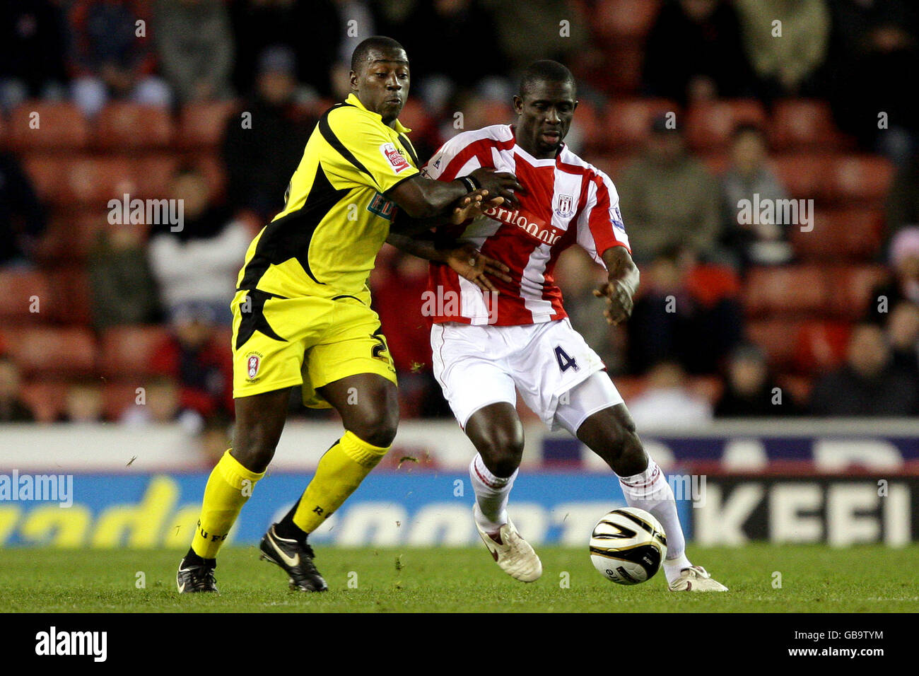 Stoke City's Seyi George Olofinjana (right) and Rotherham United's ...