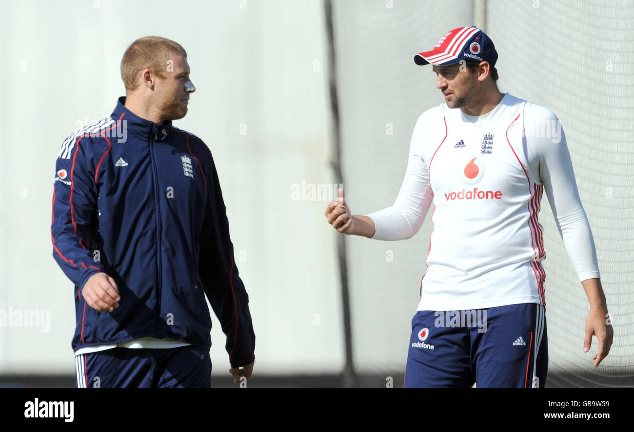 England's Andrew Flintoff and Steve Harmison (right) during training ...