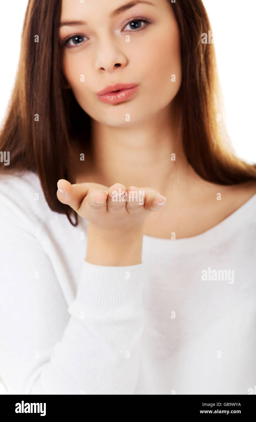 Young beautiful woman sending a kiss Stock Photo - Alamy