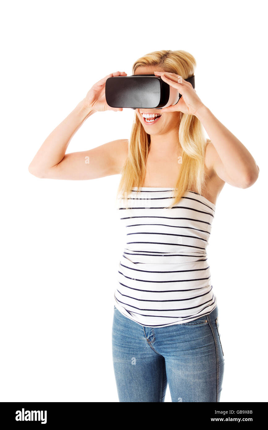Girl wearing virtual reality goggles isolated on white Stock Photo - Alamy
