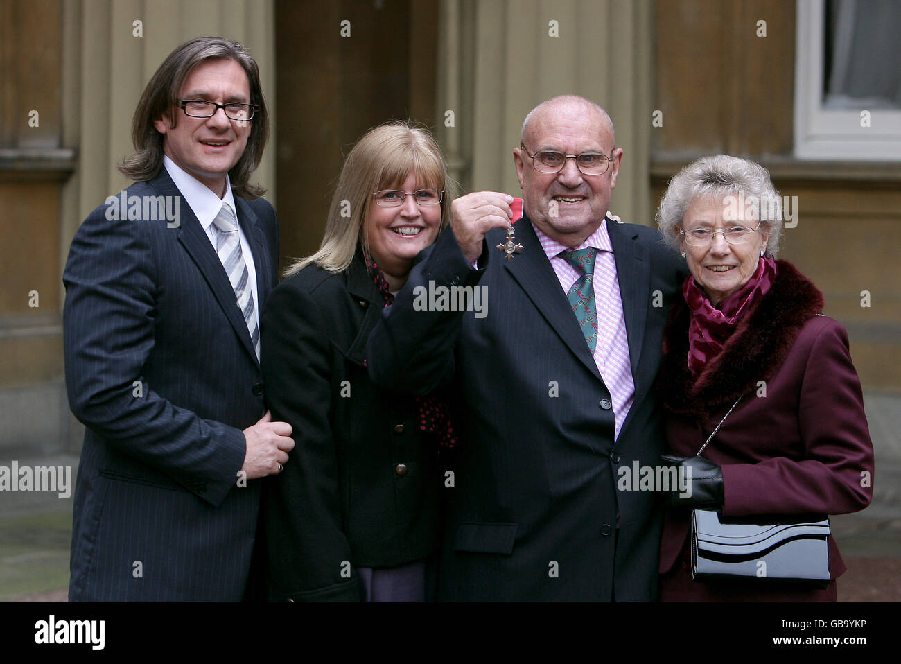With his family left to right children phil michaela holmes hi-res ...