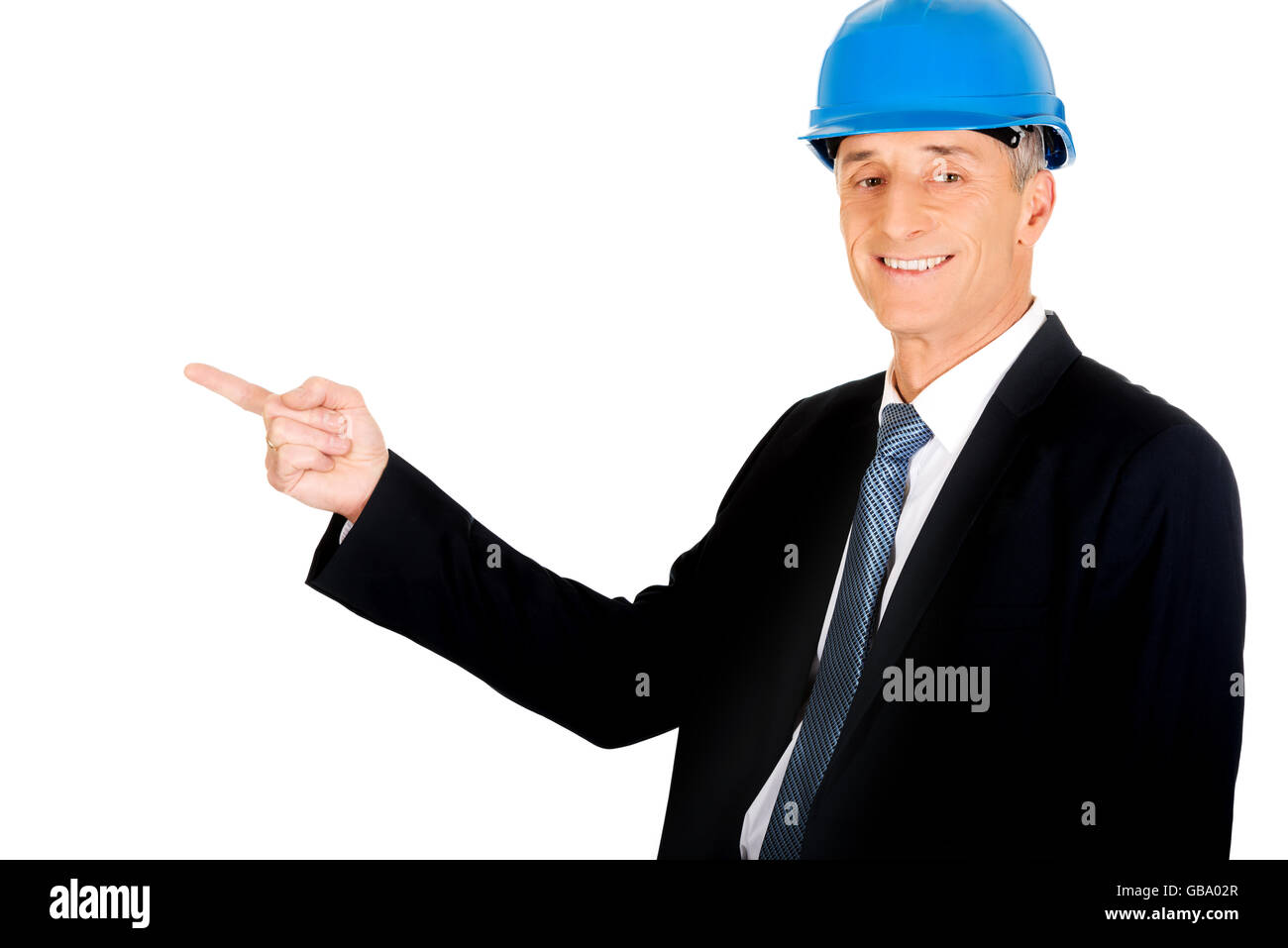 Businessman engineer pointing to the left Stock Photo - Alamy