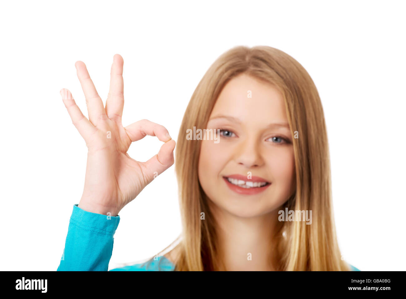 Pretty nice young woman showing hi-res stock photography and images - Alamy