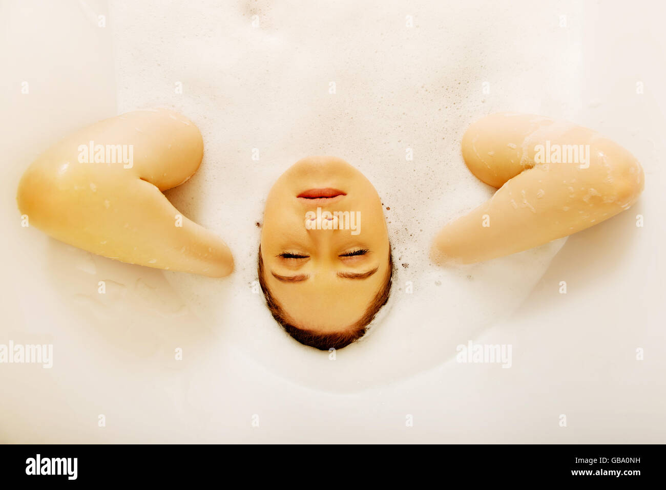 Woman washing hair bubble bath water bathroom hi-res stock photography ...