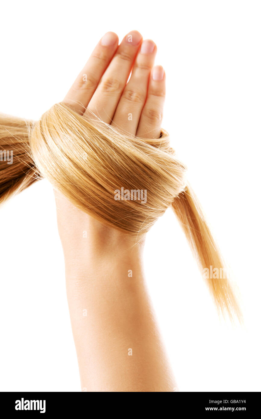 Hand holding hair. Isolated on white Stock Photo - Alamy