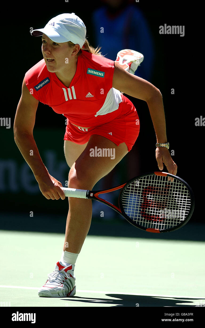 Justine henin hardenne of belgium in action hi-res stock photography ...