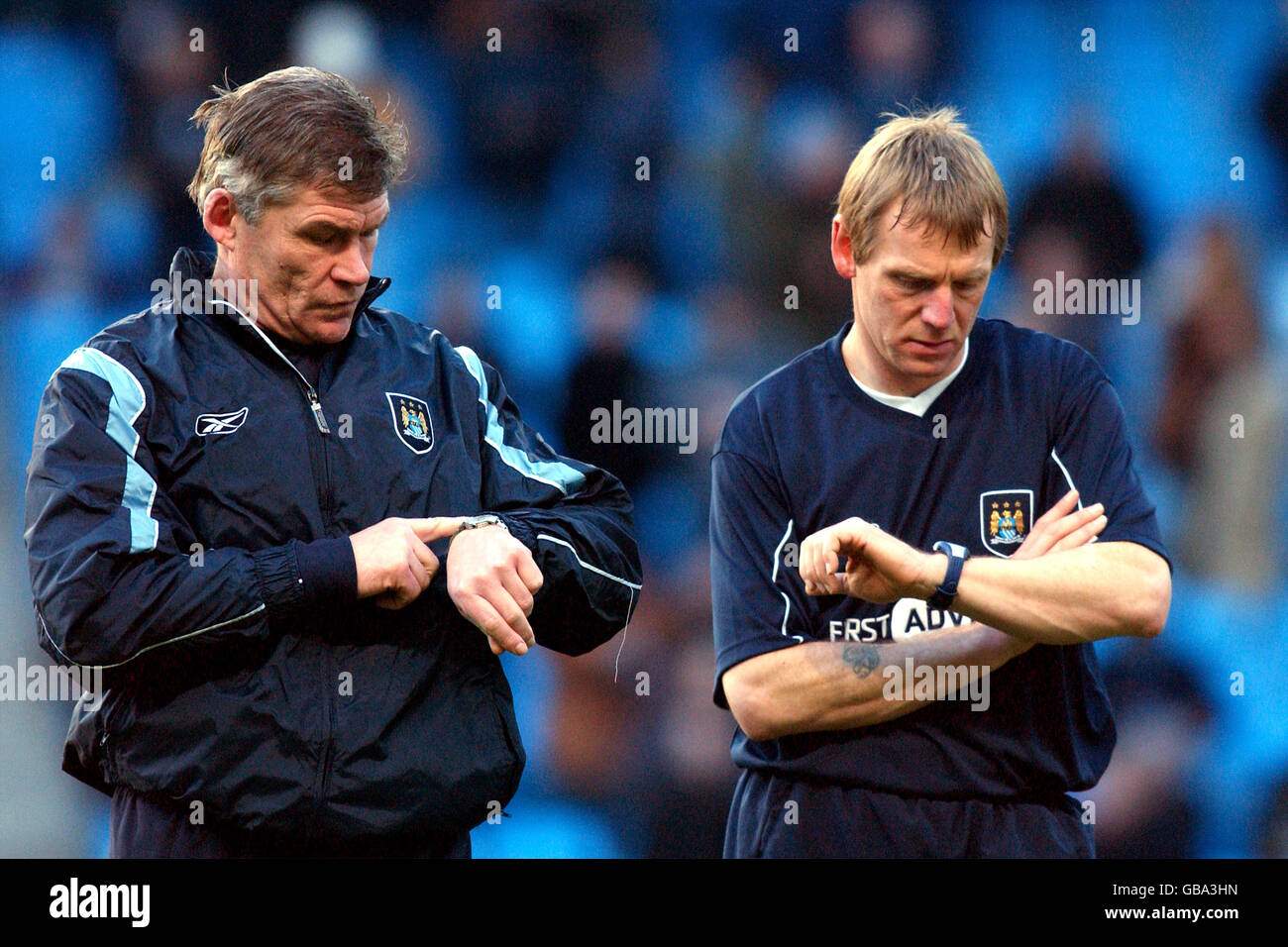 Manchester City's head coach Derek Fazackerley (l) and coach Stuart ...