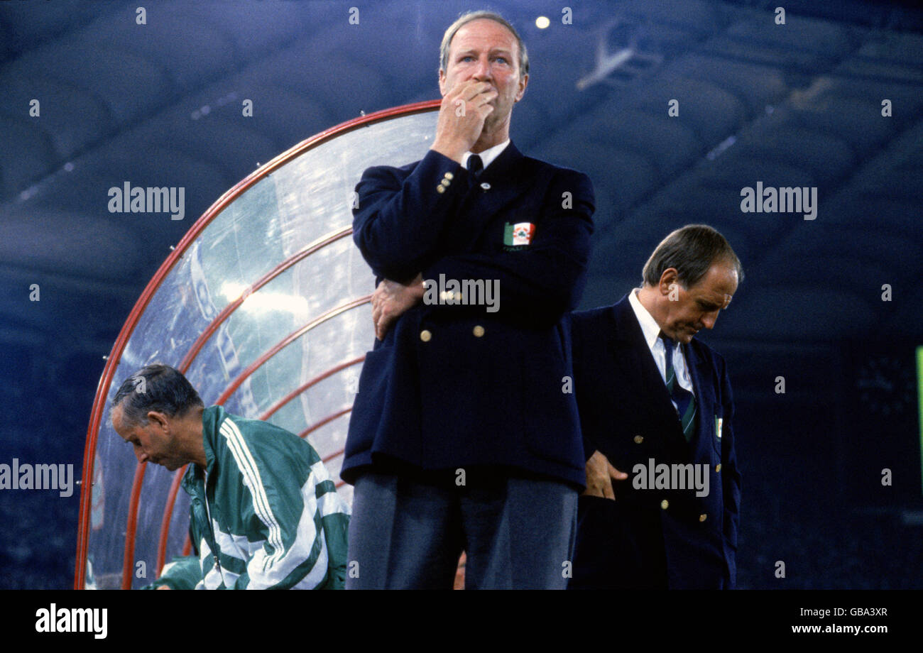 Ireland manager Jack Charlton (c) swallows the evidence as assistant ...